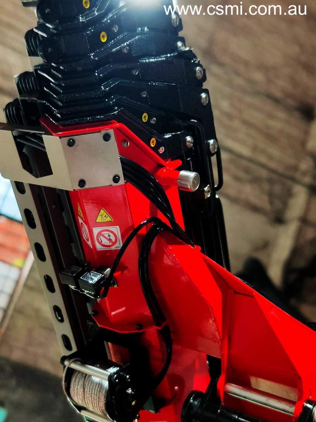 CSMI Fassi 1650 truck loading crane